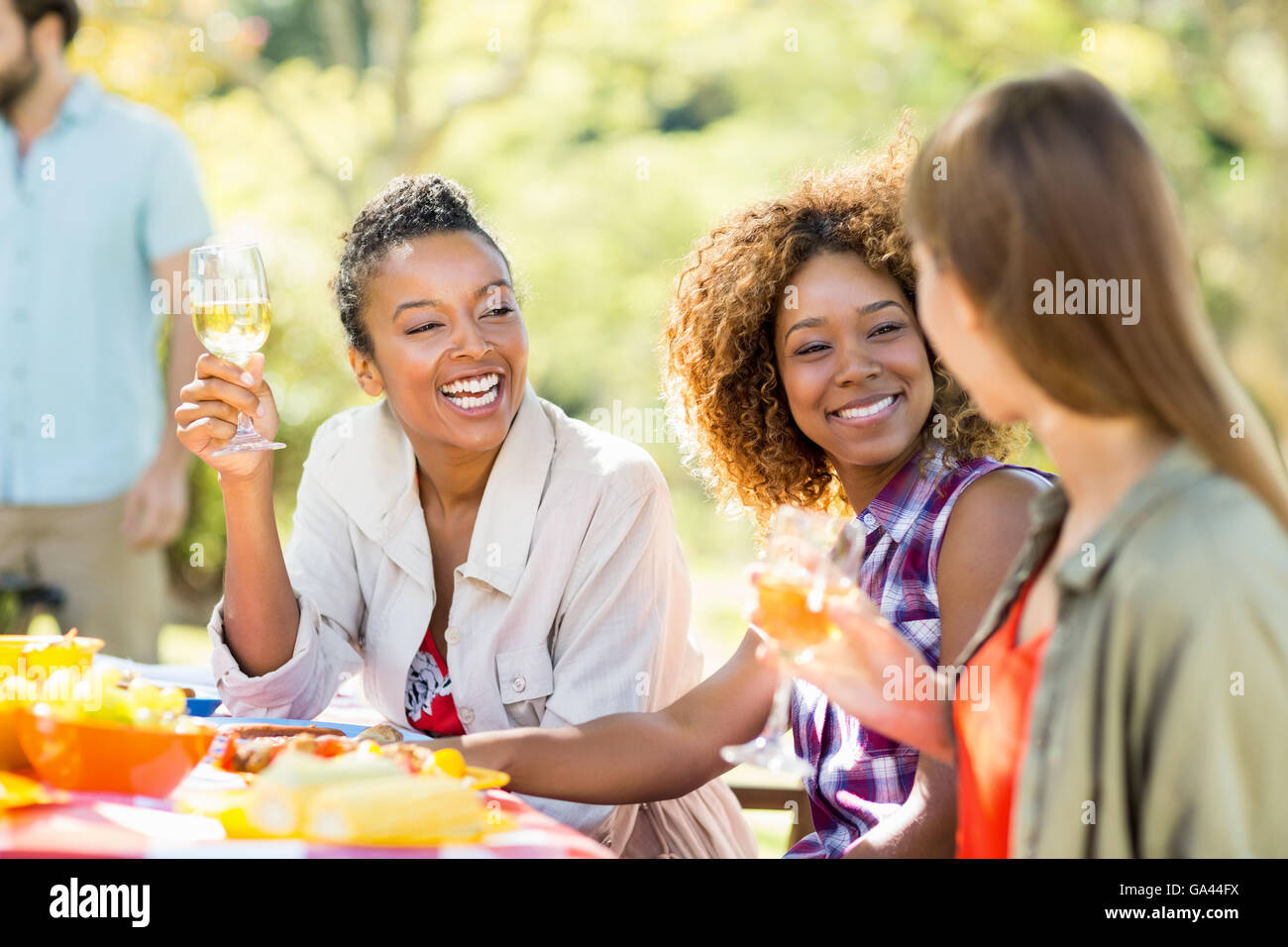 Friends having breakfast together Stock Photo - Alamy
