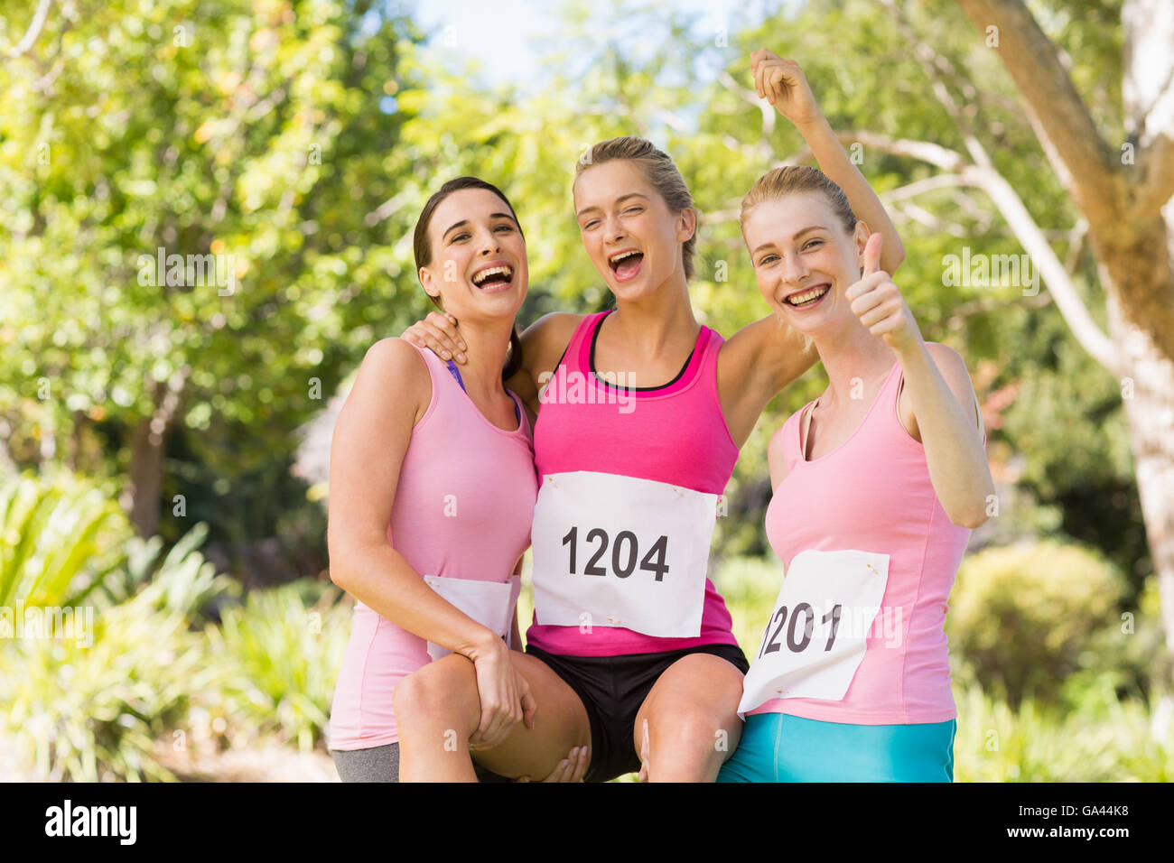 Young athlete women cheering after victory Stock Photo - Alamy