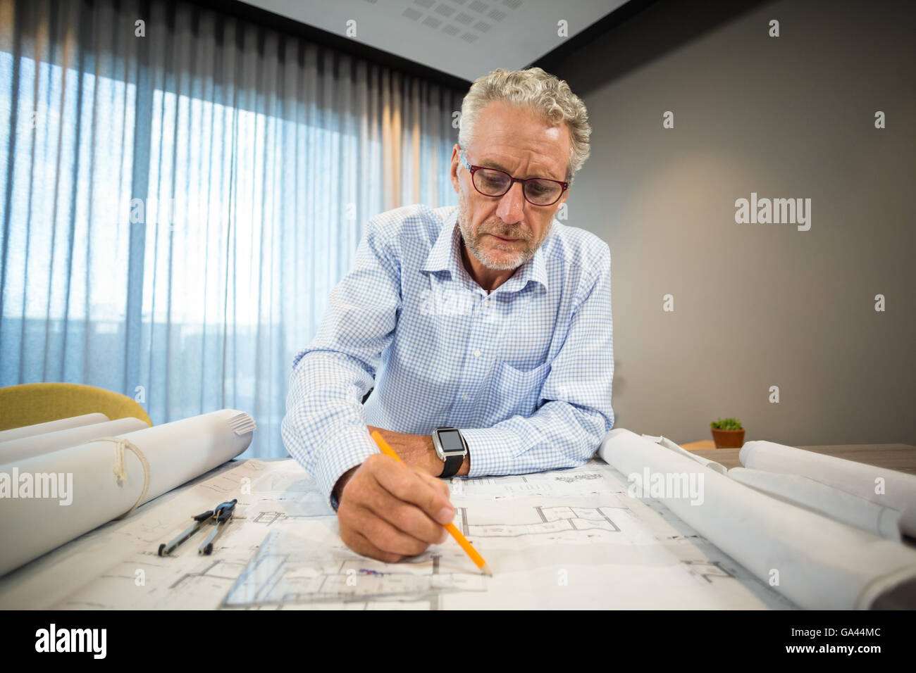 Architect blueprint compass on desk hi-res stock photography and images ...