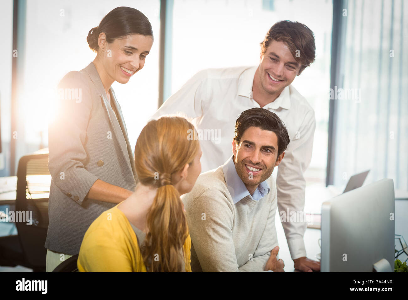 Business people having discussion with each other Stock Photo - Alamy
