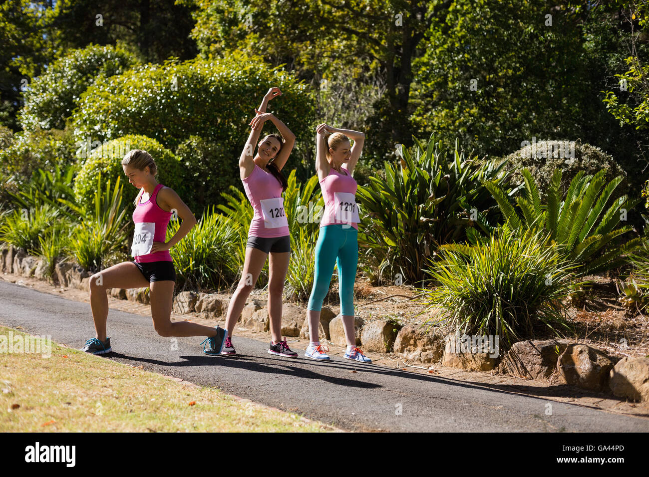 Young athlete women exercising Stock Photo - Alamy