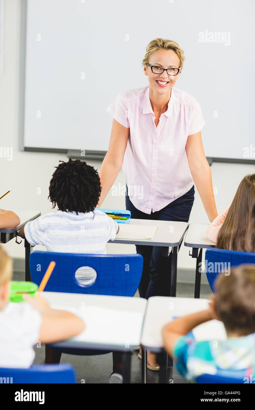 Teacher teaching in classroom Stock Photo - Alamy