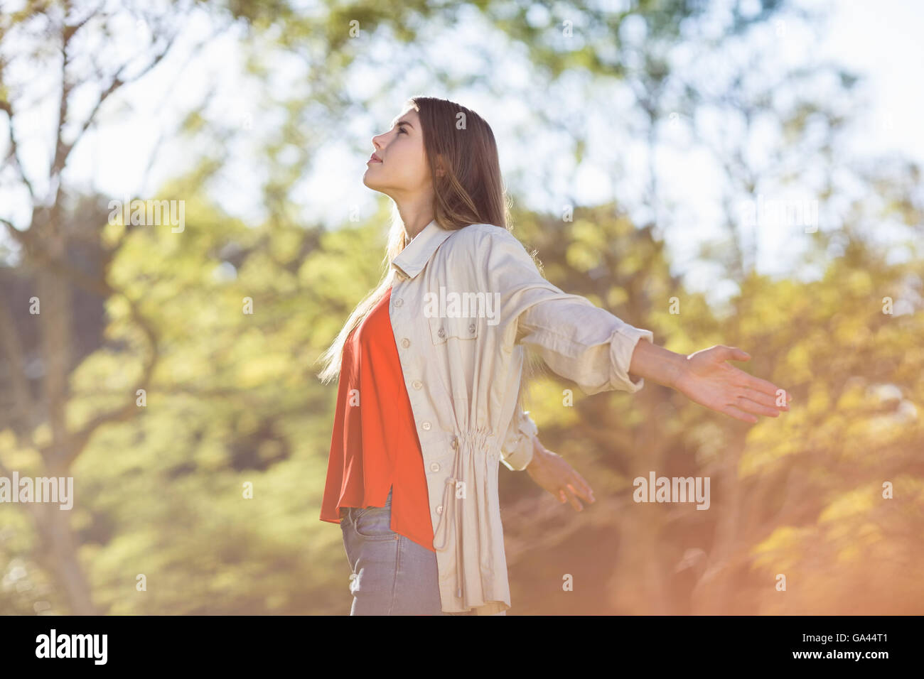 Female standing stretching arms out hi-res stock photography and images ...