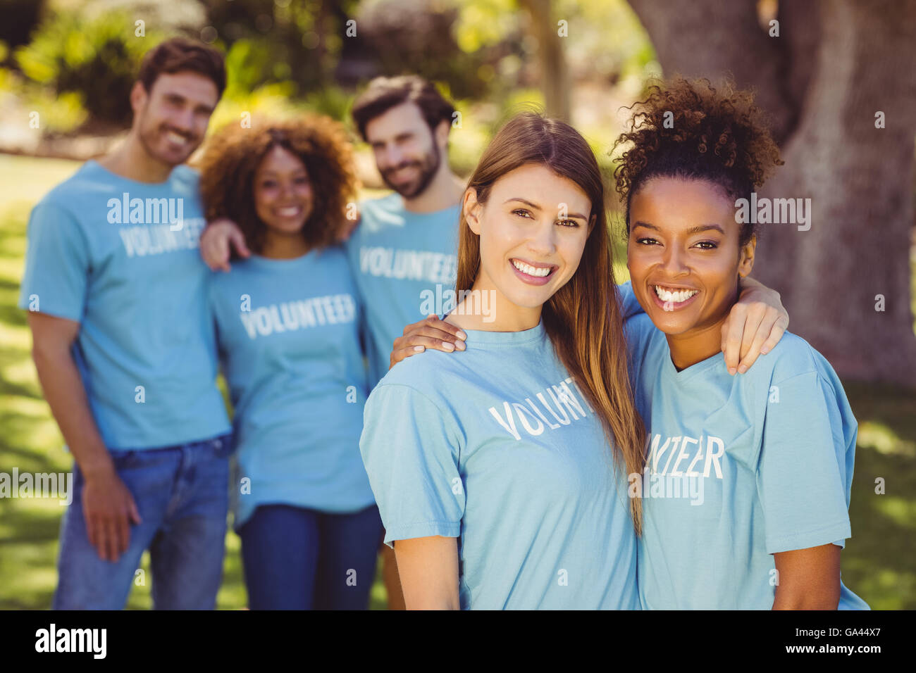 Man volunteer posing smiling hi-res stock photography and images - Alamy