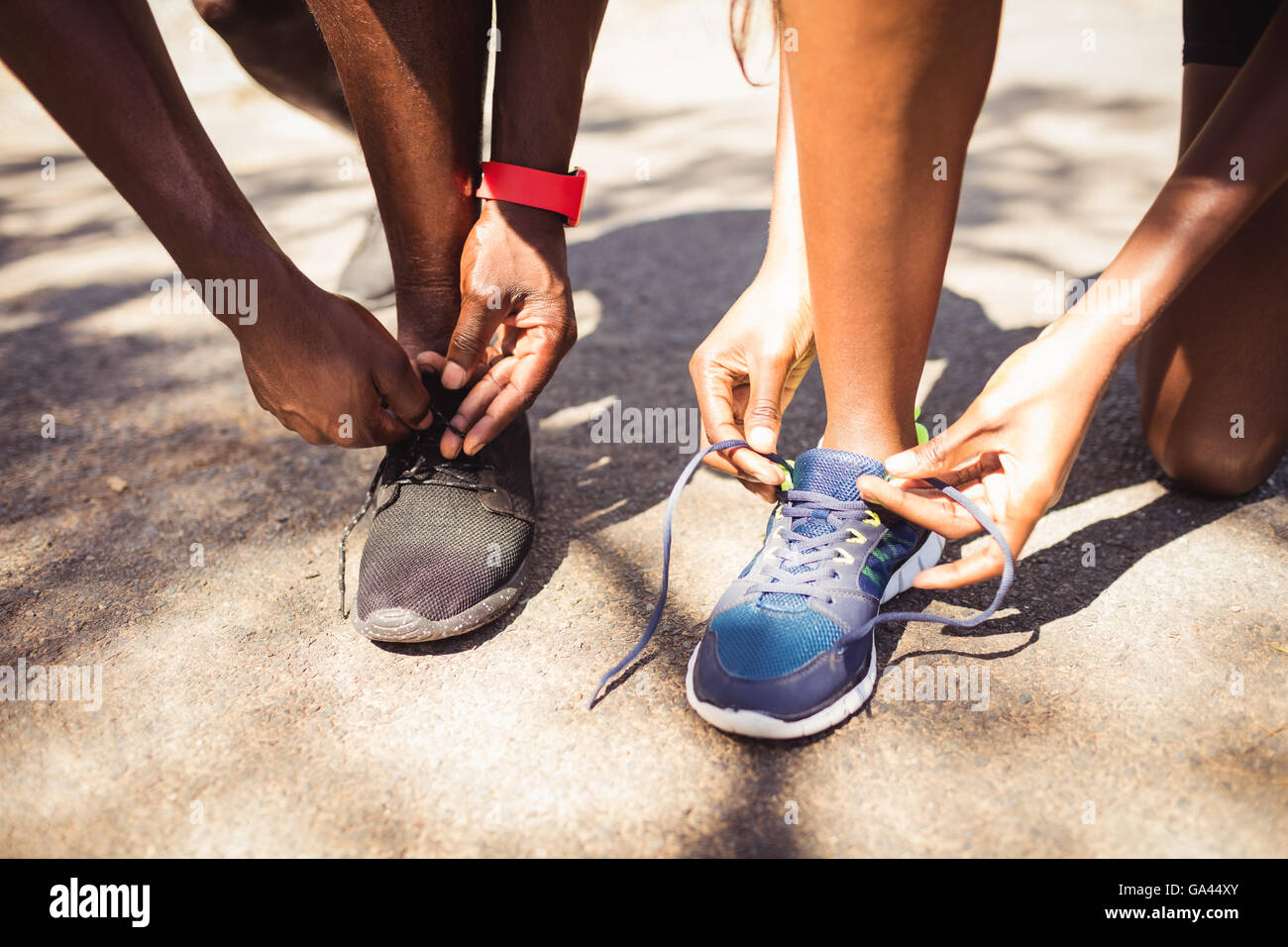 Focus on family doing laces Stock Photo - Alamy