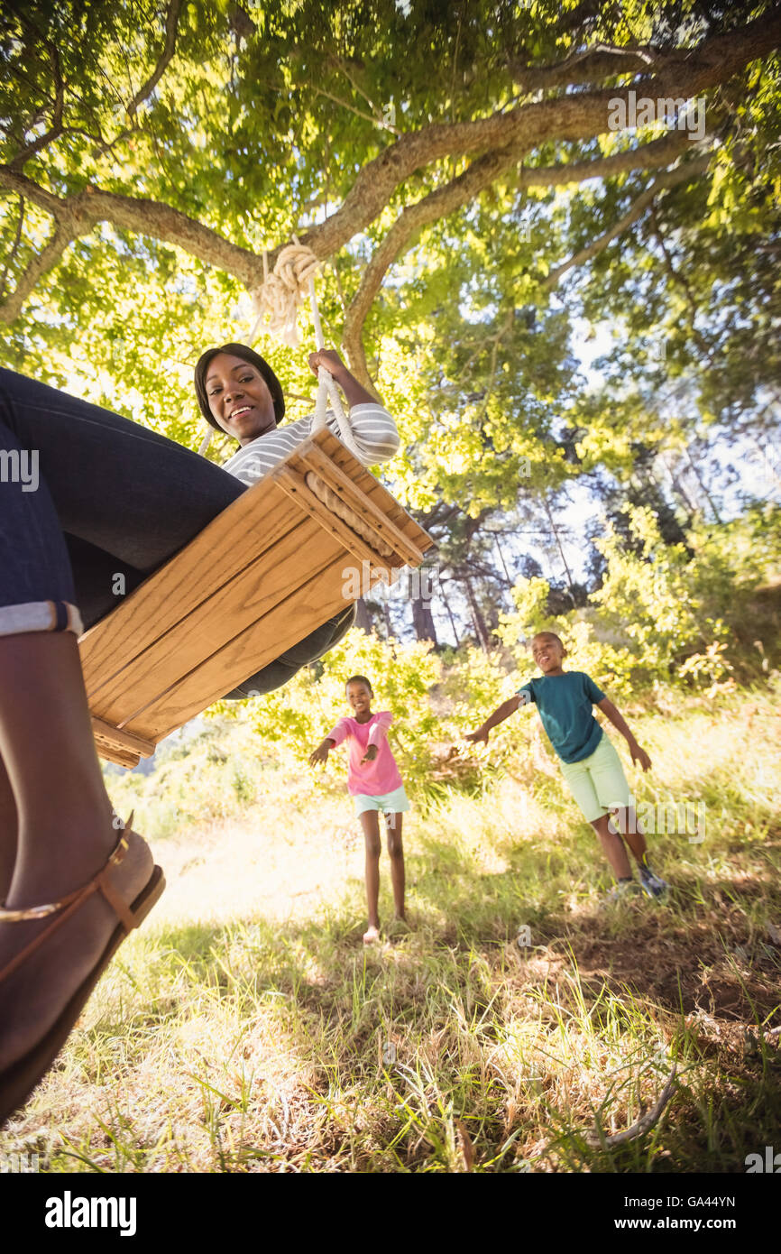 Happy family enjoying together Stock Photo - Alamy