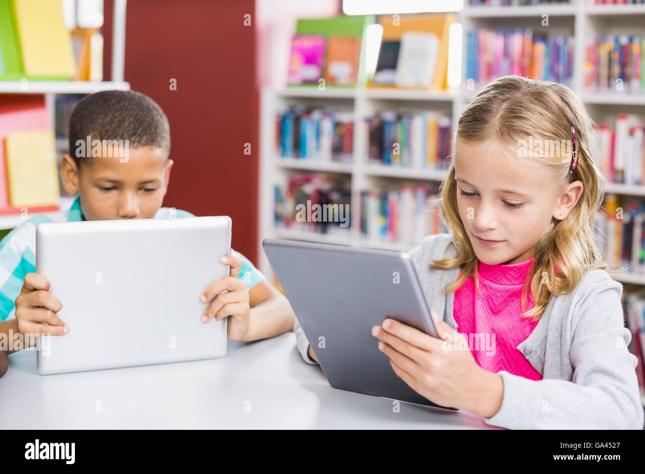 Kids studying tablet hi-res stock photography and images - Alamy