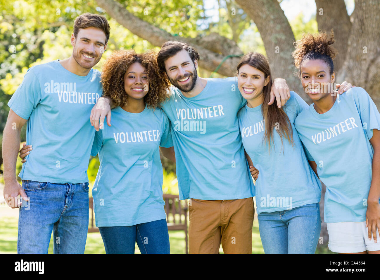 Portrait of volunteer group posing Stock Photo - Alamy