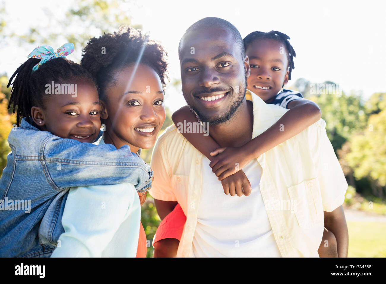 Happy family posing together Stock Photo - Alamy