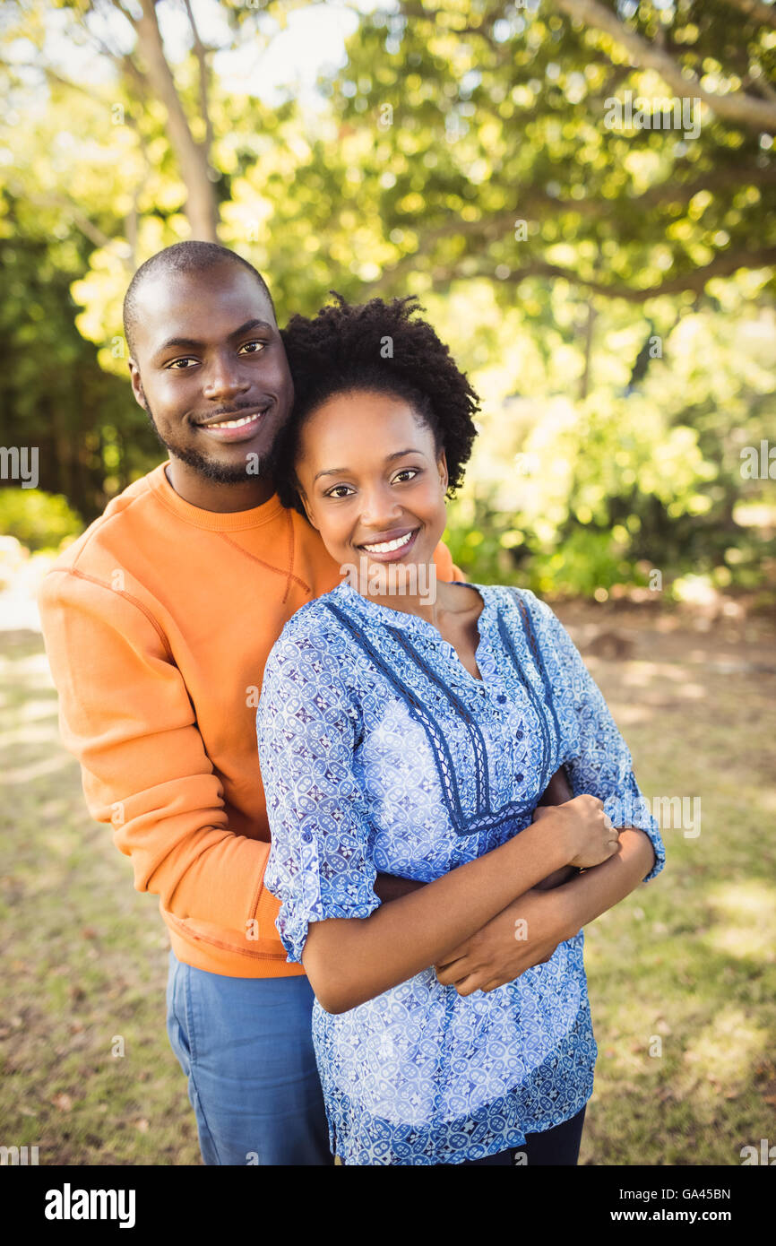 Happy couple posing together Stock Photo - Alamy