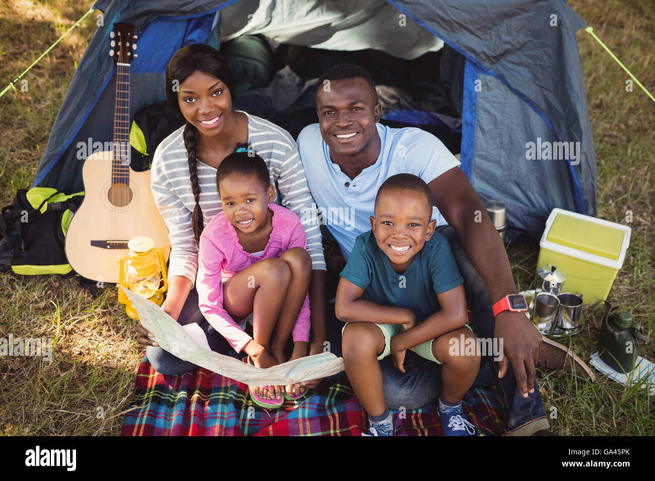 Happy family posing together Stock Photo - Alamy