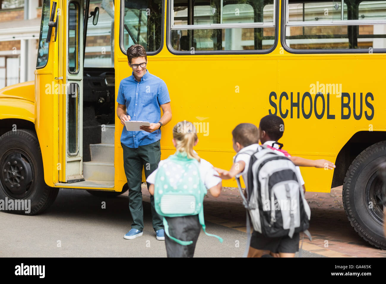 Kids entering school hi-res stock photography and images - Alamy