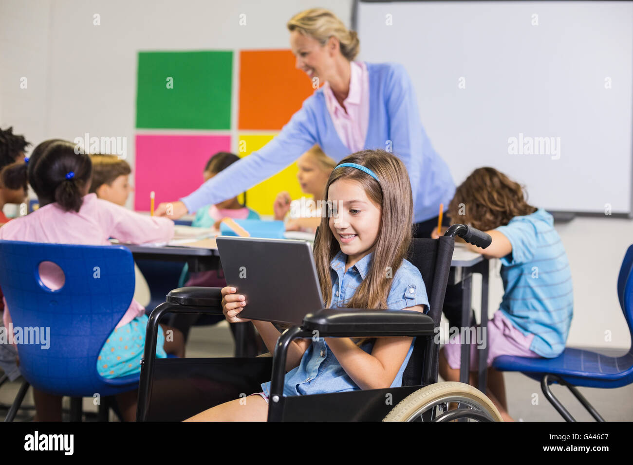 Teacher with disabled kids reading hi-res stock photography and images ...