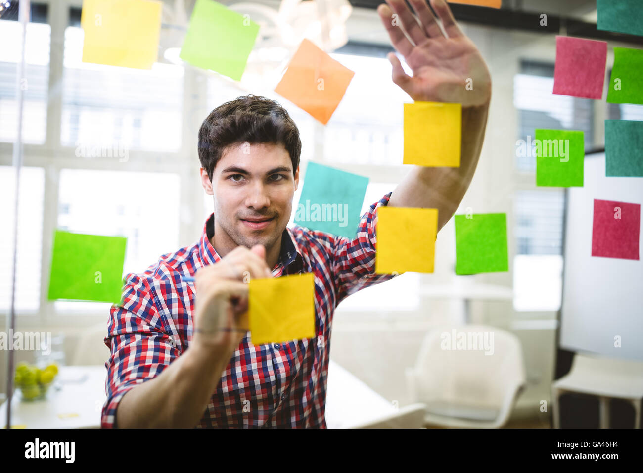 Colored man writing hi-res stock photography and images - Alamy