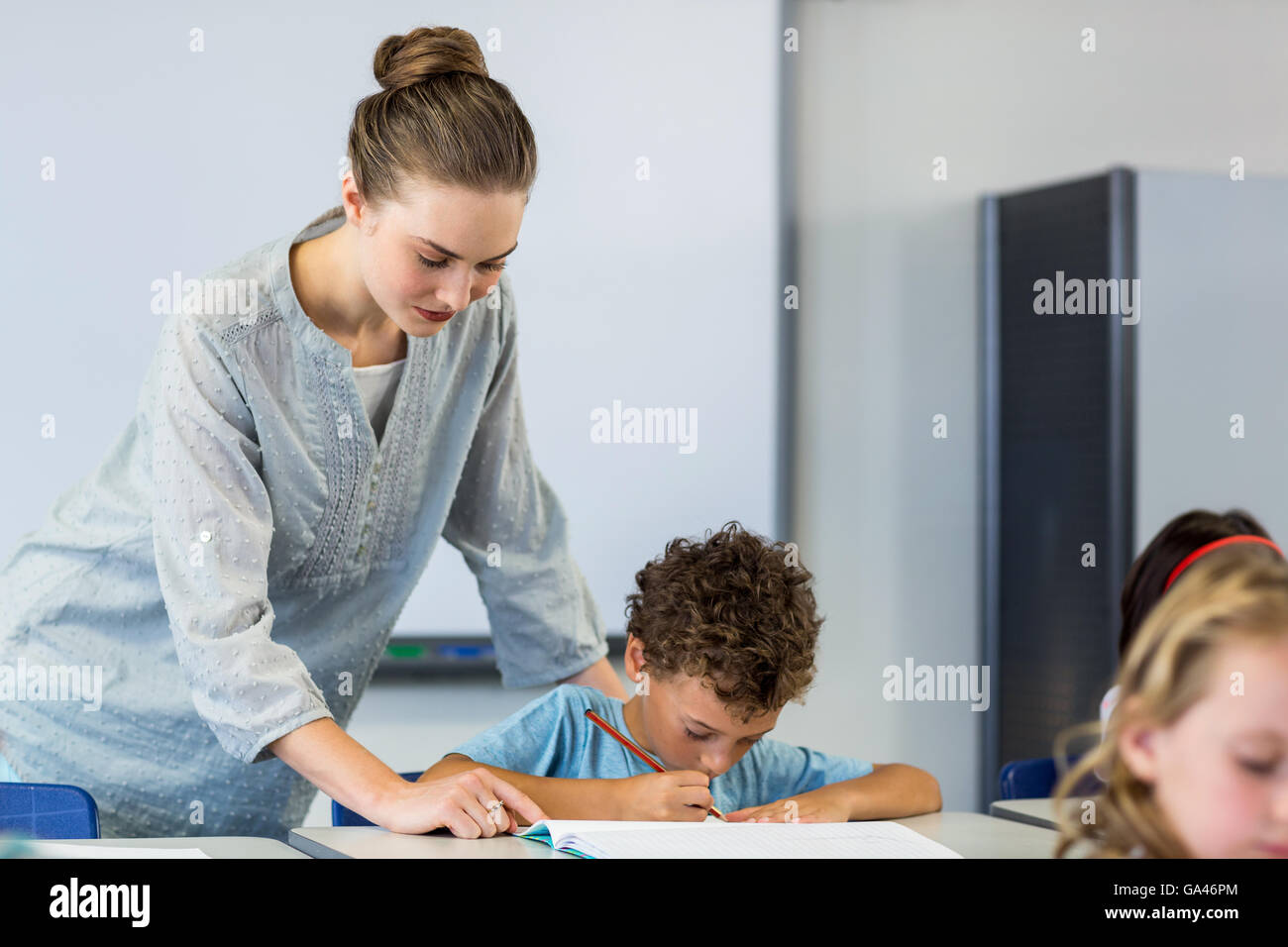 Teacher writing class preschool hi-res stock photography and images - Alamy