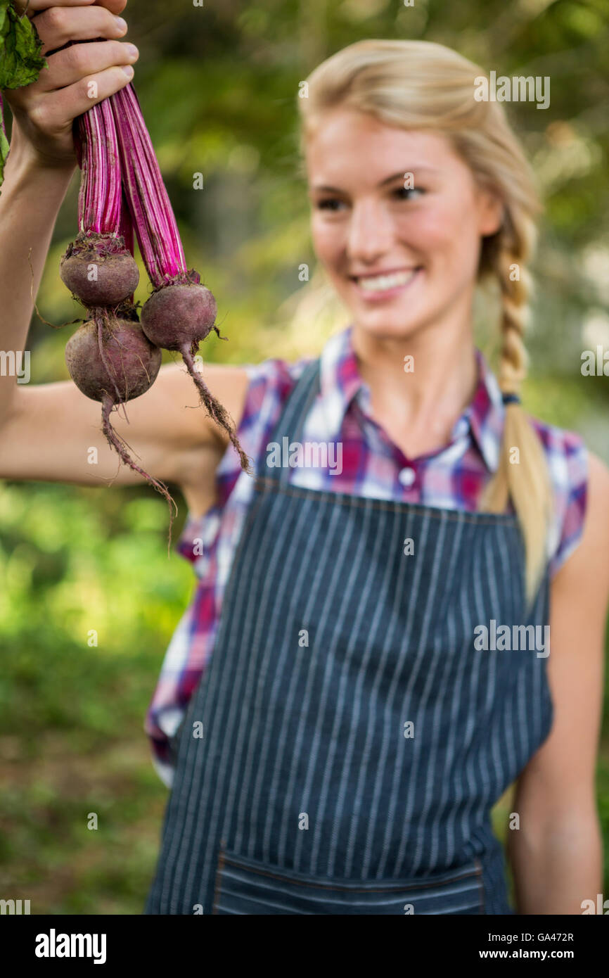 Woman holding young beets hi-res stock photography and images - Alamy