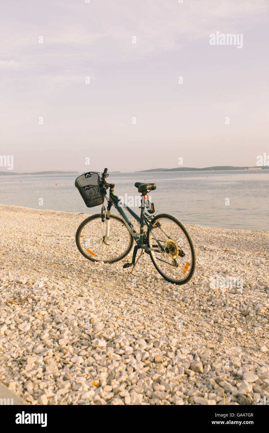 Bicycle on the beach Stock Photo - Alamy