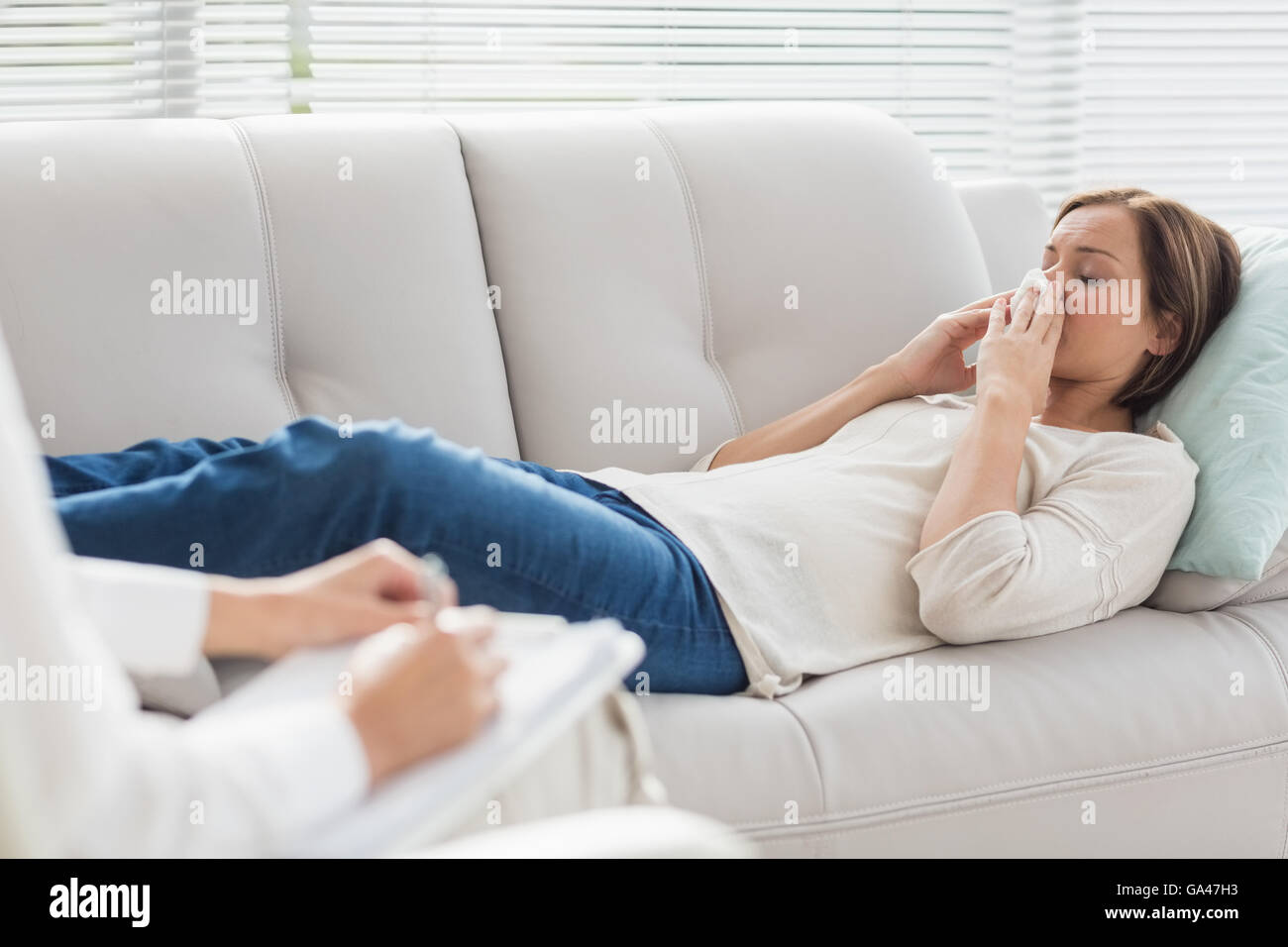 Therapist couch woman lying down hi-res stock photography and images ...