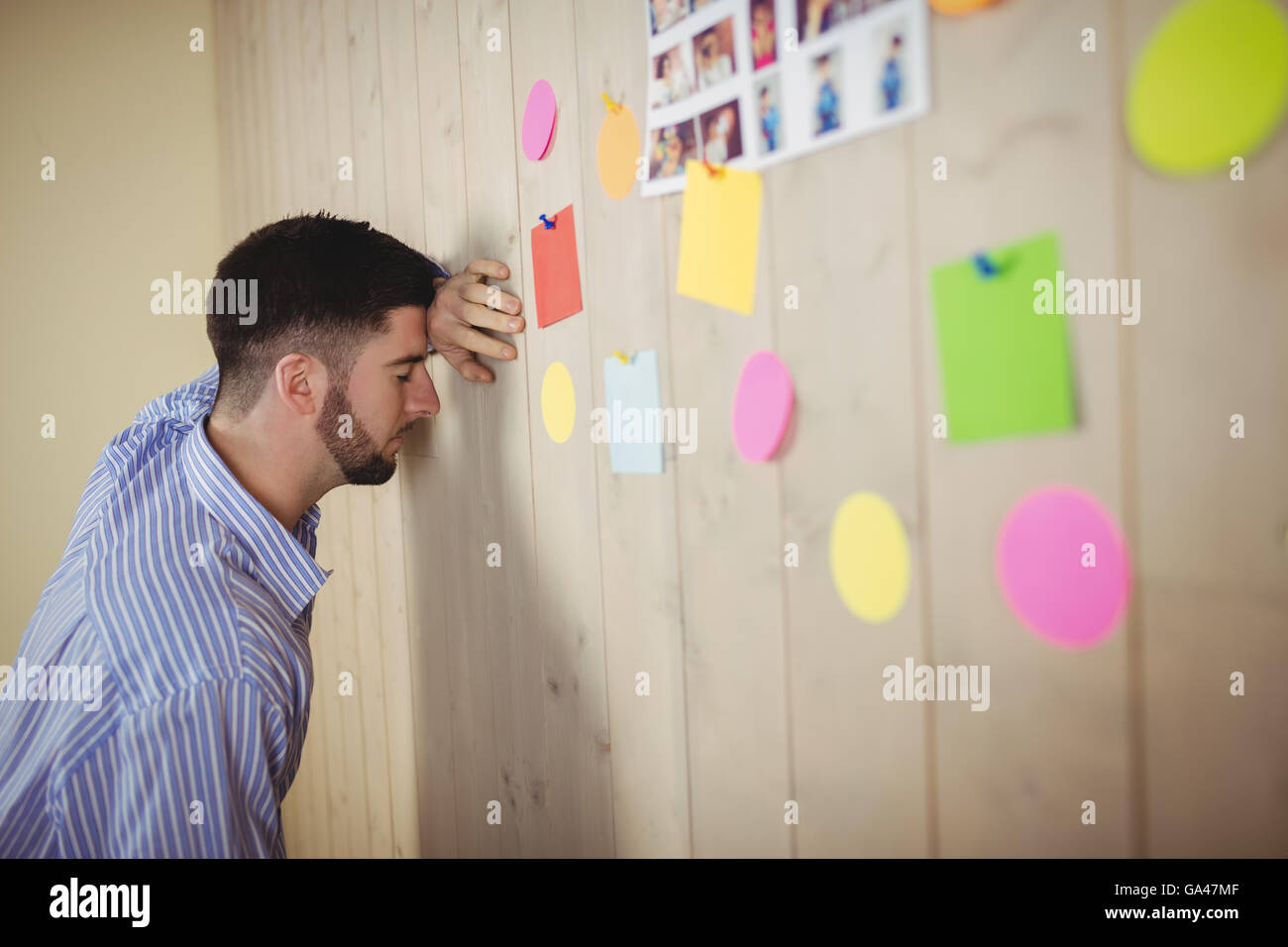 Tired young male standing hi-res stock photography and images - Alamy