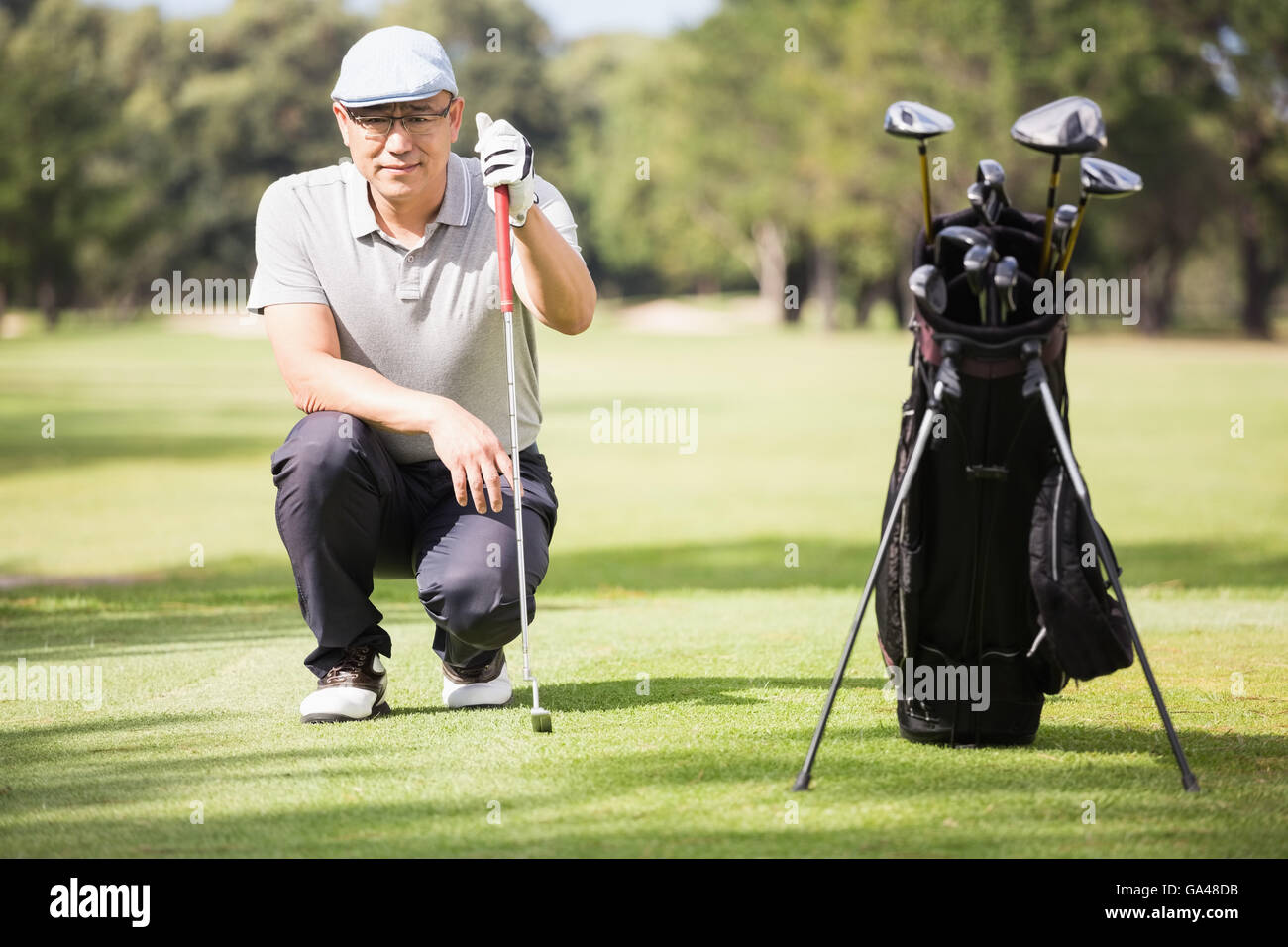 Sport golf crouching hi-res stock photography and images - Alamy