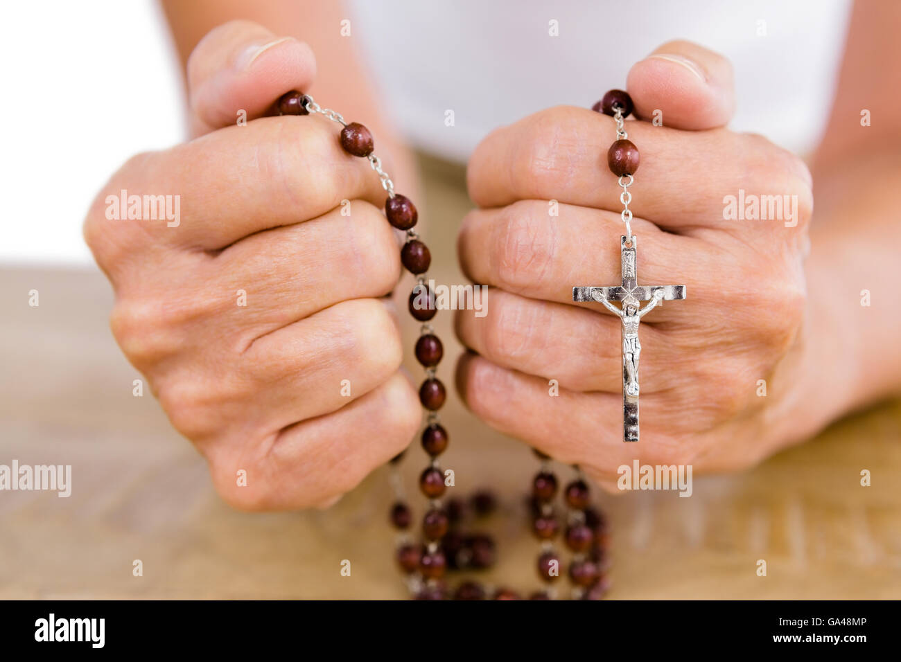 Woman with holy rosary hi-res stock photography and images - Alamy