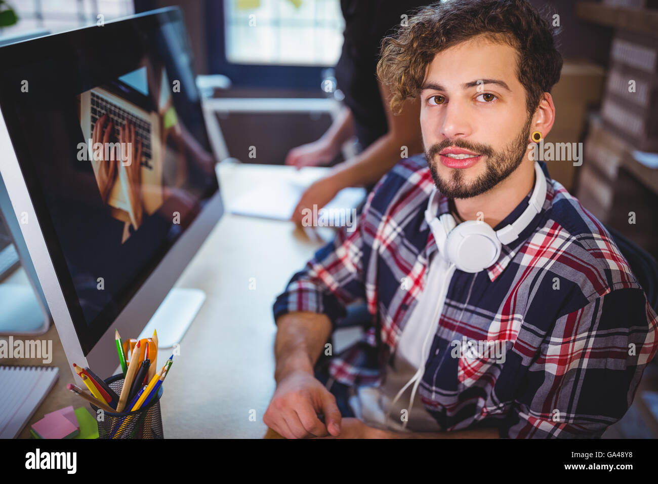 Businessman sitting computer in office hi-res stock photography and ...