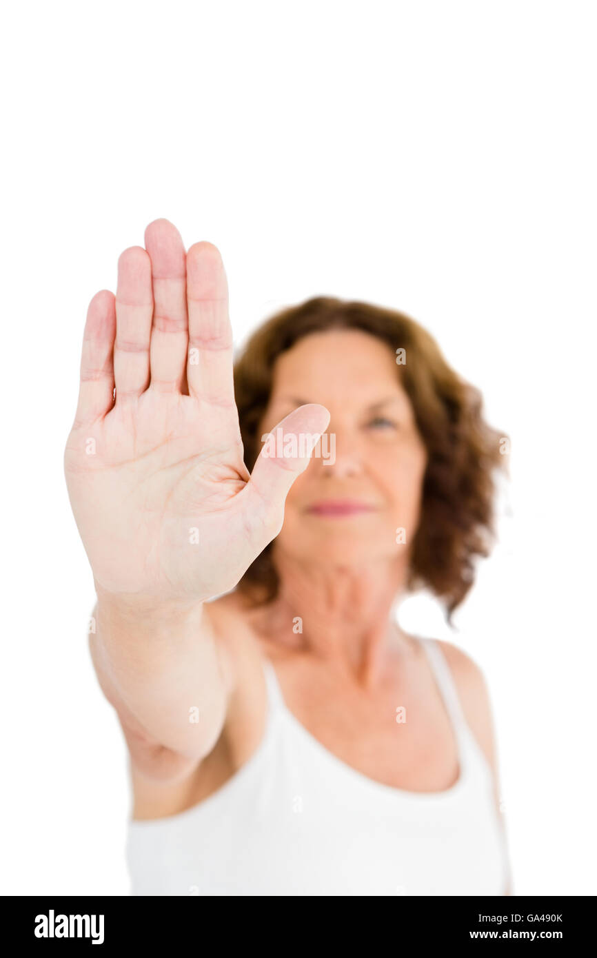 Woman showing stop sign Stock Photo - Alamy