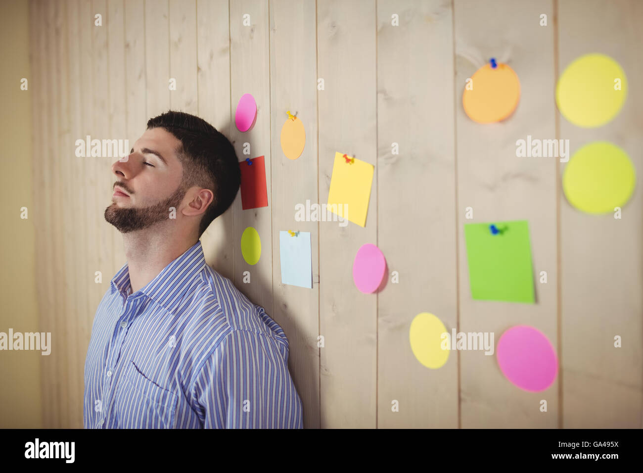 Troubled man in office Stock Photo - Alamy