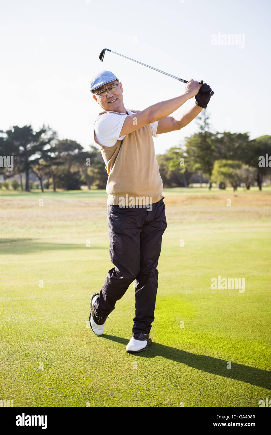 Portrait of sportsman playing golf Stock Photo - Alamy