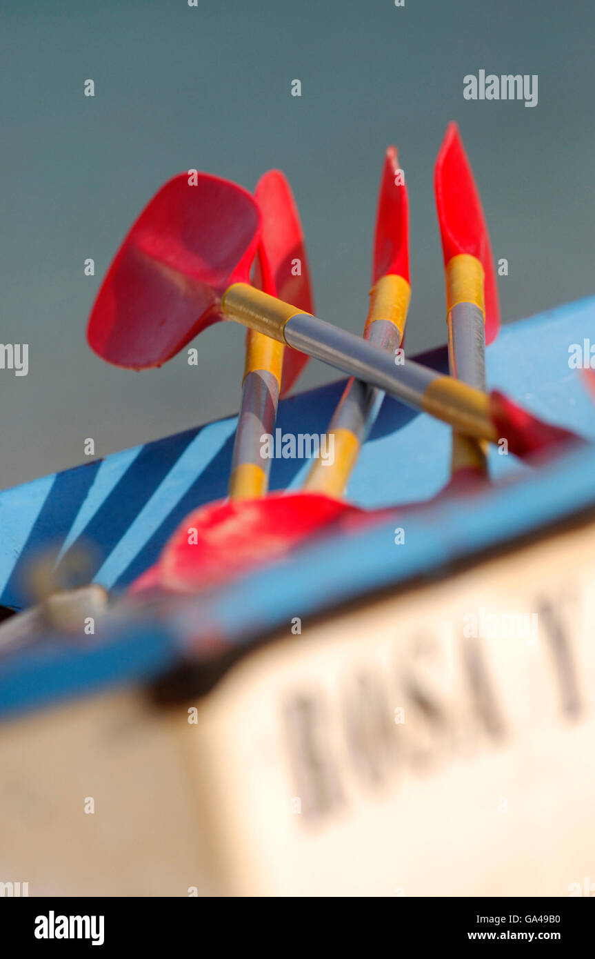 four red Oars Stock Photo - Alamy