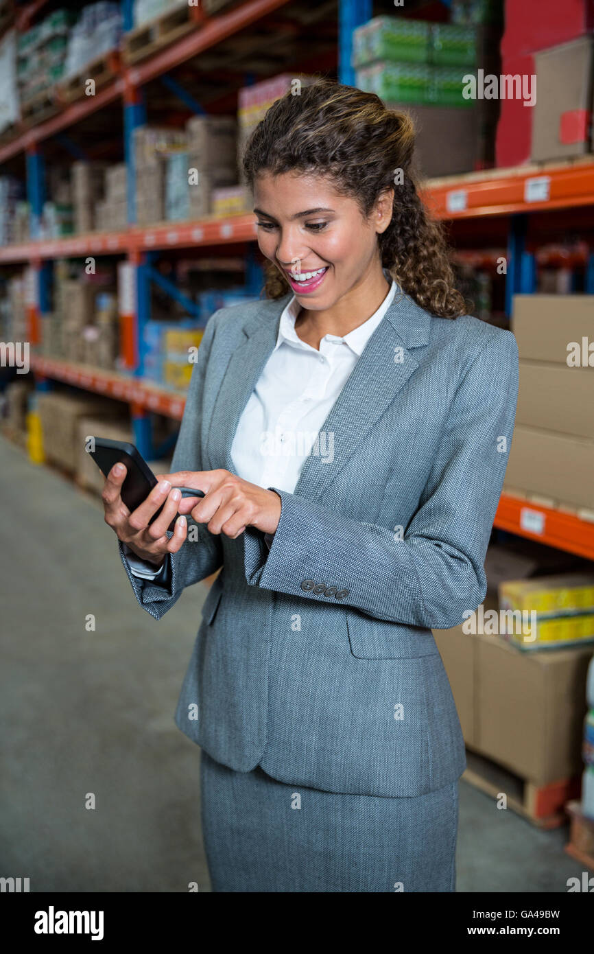 Business woman texting hi-res stock photography and images - Alamy