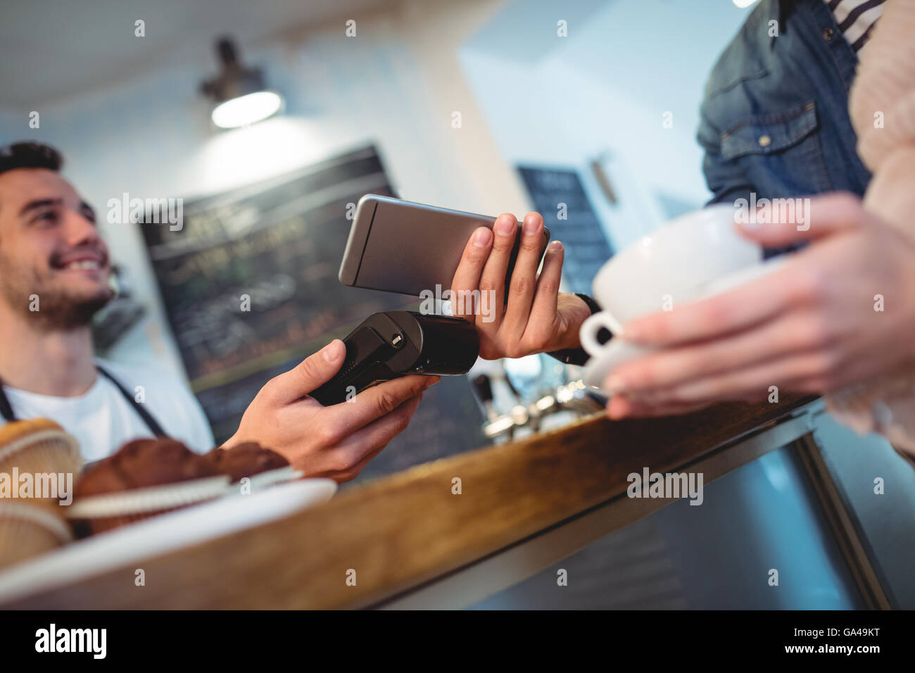 Standing customer hi-res stock photography and images - Alamy