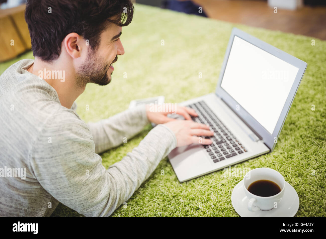 Working lying down hi-res stock photography and images - Alamy