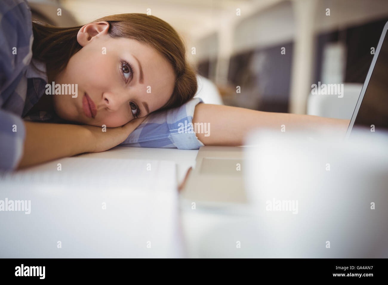 Tired at office desk hi-res stock photography and images - Alamy