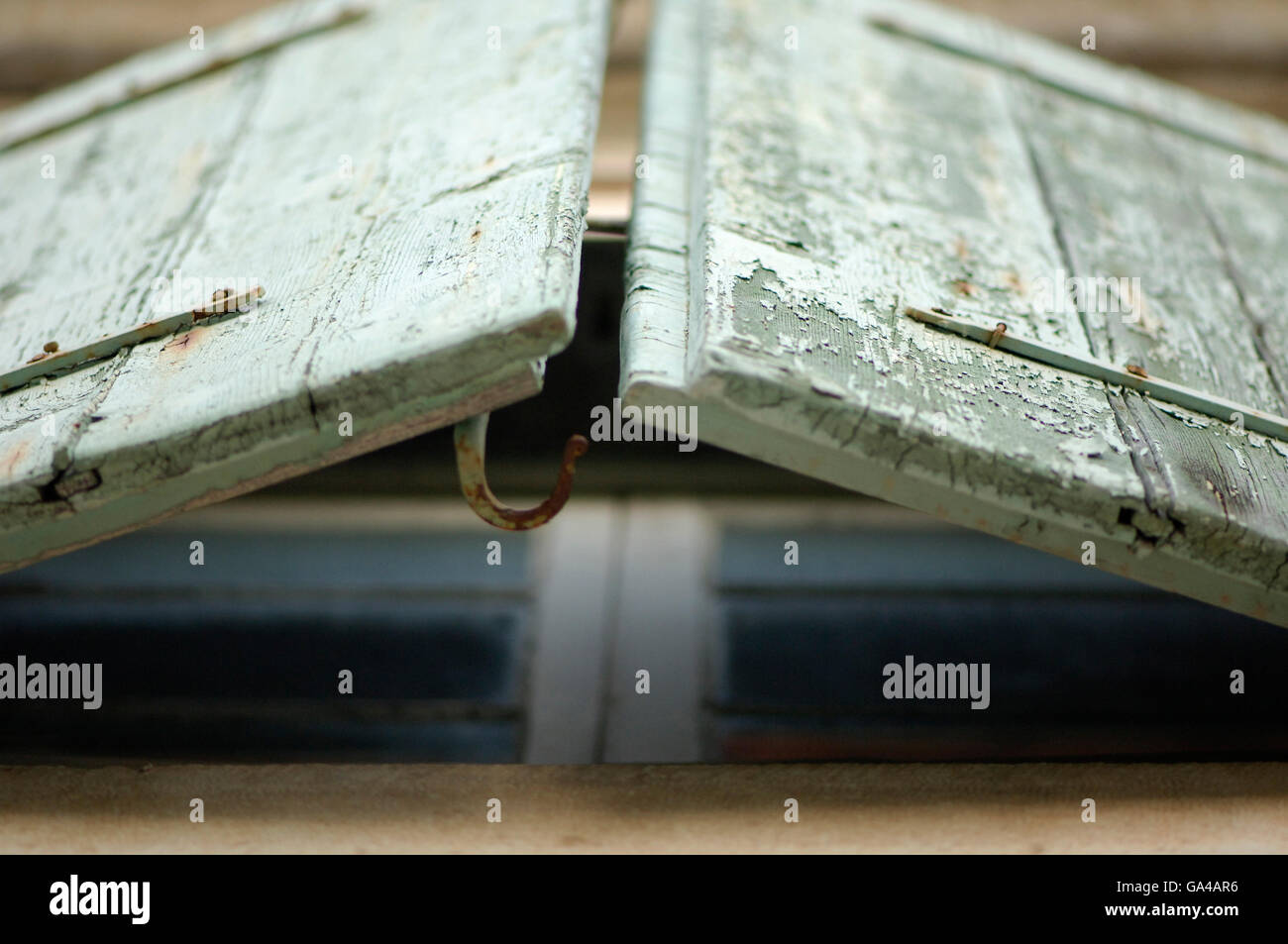 Distressed wood shutters hi-res stock photography and images - Alamy