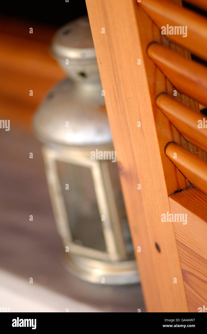 Shutters with lantern Stock Photo - Alamy