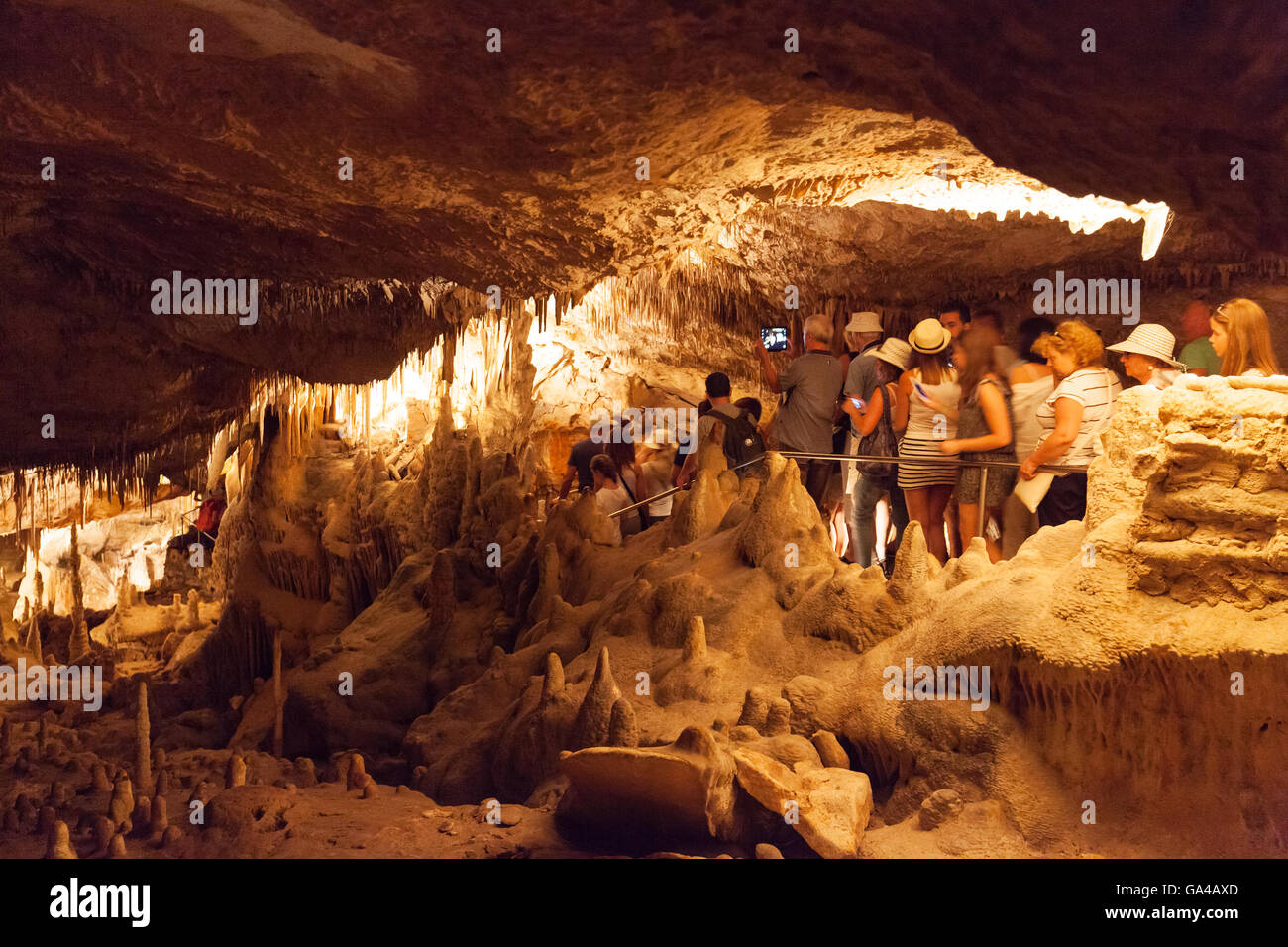 Tourists walking through the Caves of Drach, Mallorca ( Majorca ...