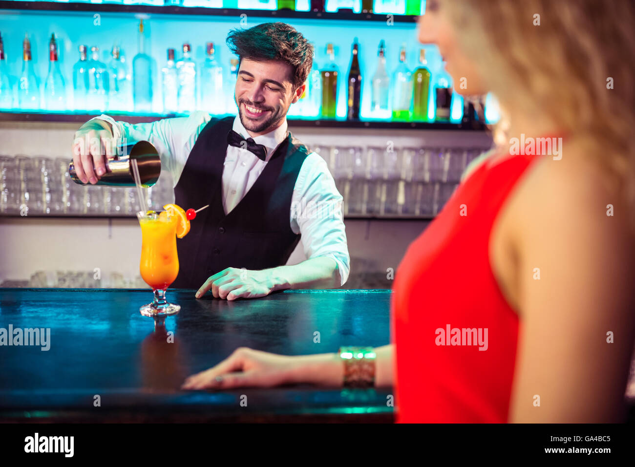 Bartender pouring cocktail hi-res stock photography and images - Alamy