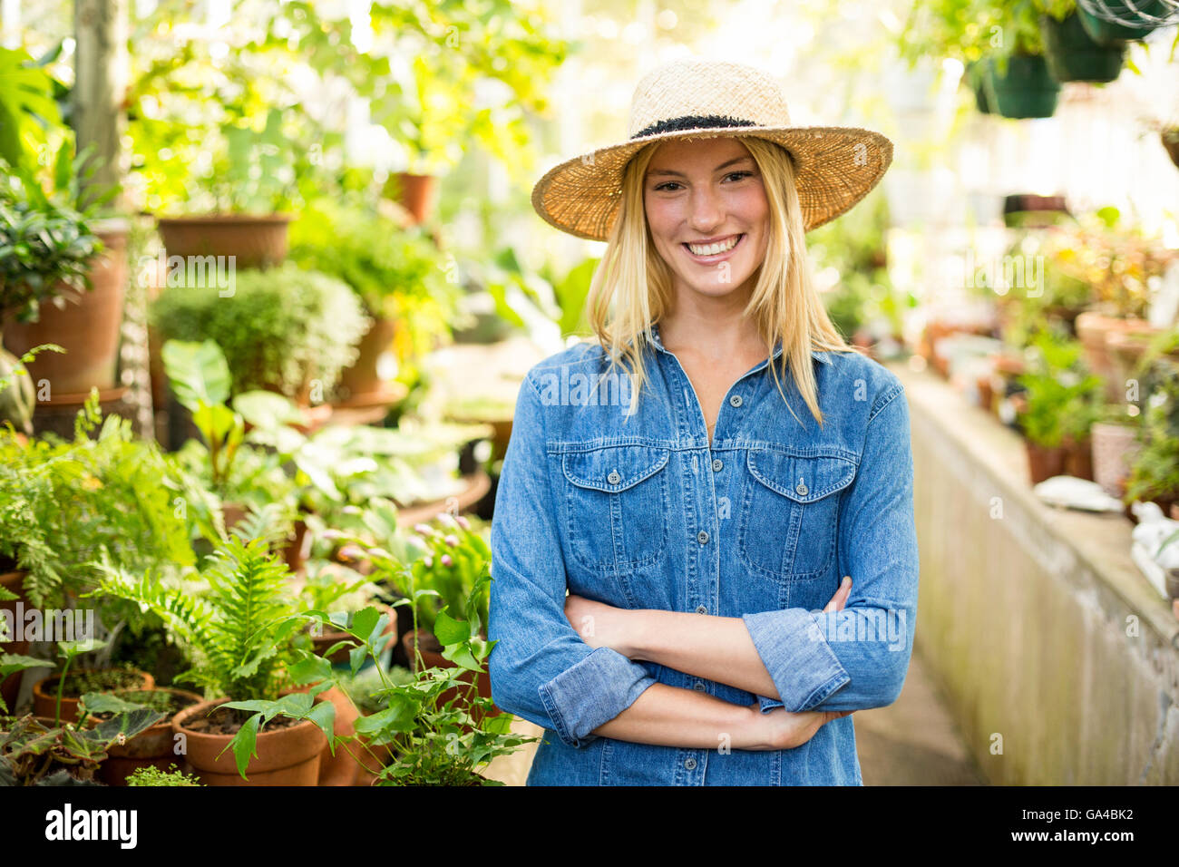 Beautiful young woman gardener hi-res stock photography and images - Alamy