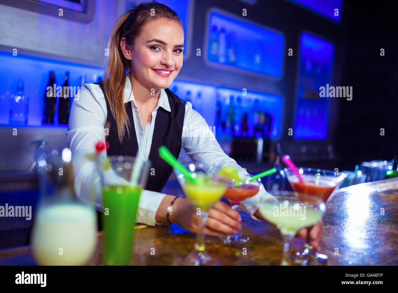 Portrait of beautiful bartender standing Stock Photo - Alamy