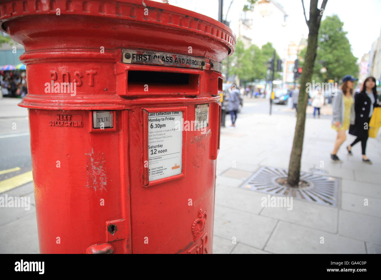 A red letter box on famous Oxford Street, in central London, England ...