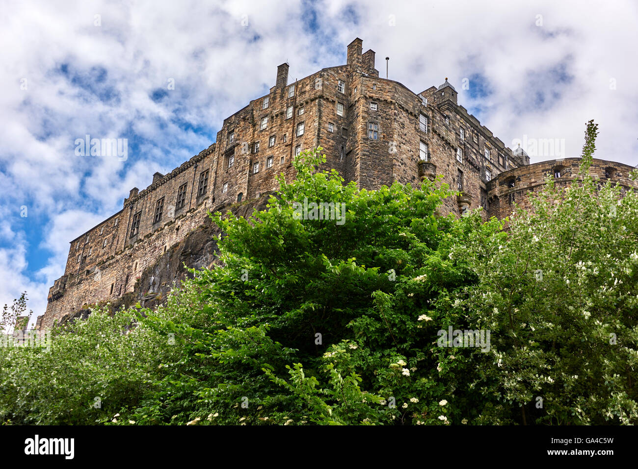 Edinburgh Castle is a historic fortress, which dominates the skyline of ...