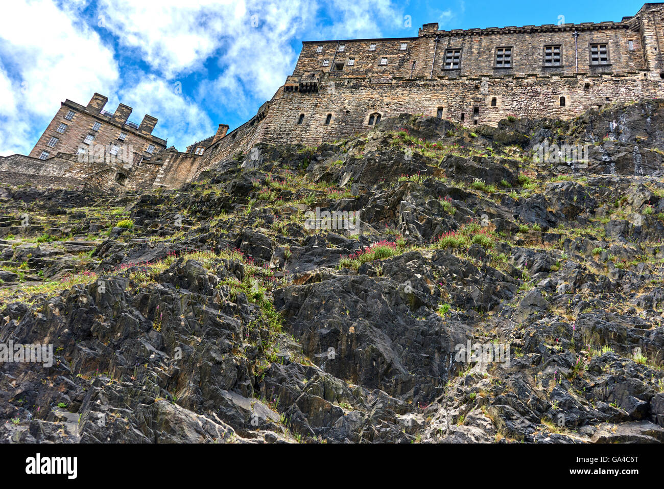 Edinburgh Castle is a historic fortress, which dominates the skyline of ...