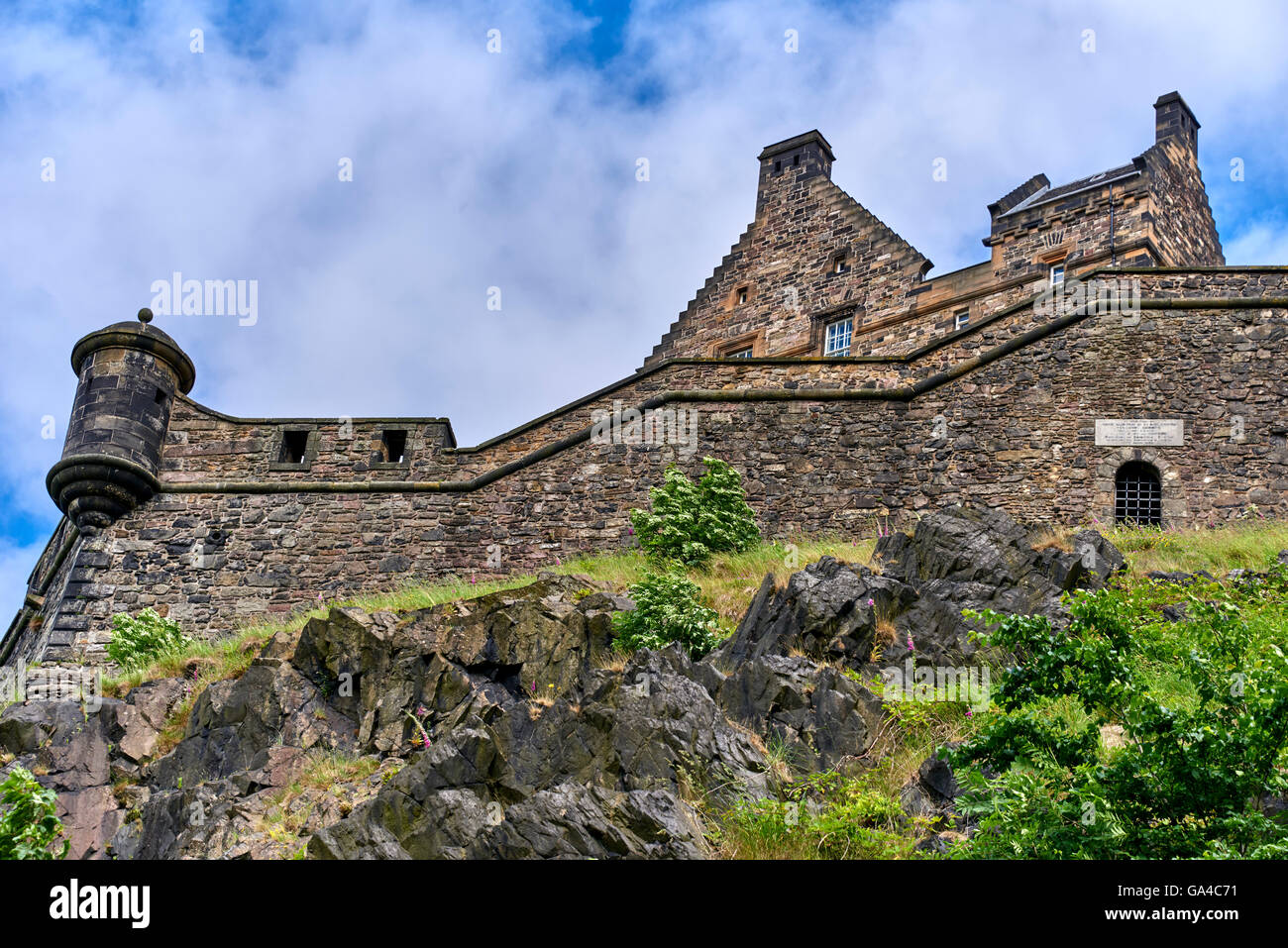 Edinburgh Castle is a historic fortress, which dominates the skyline of ...
