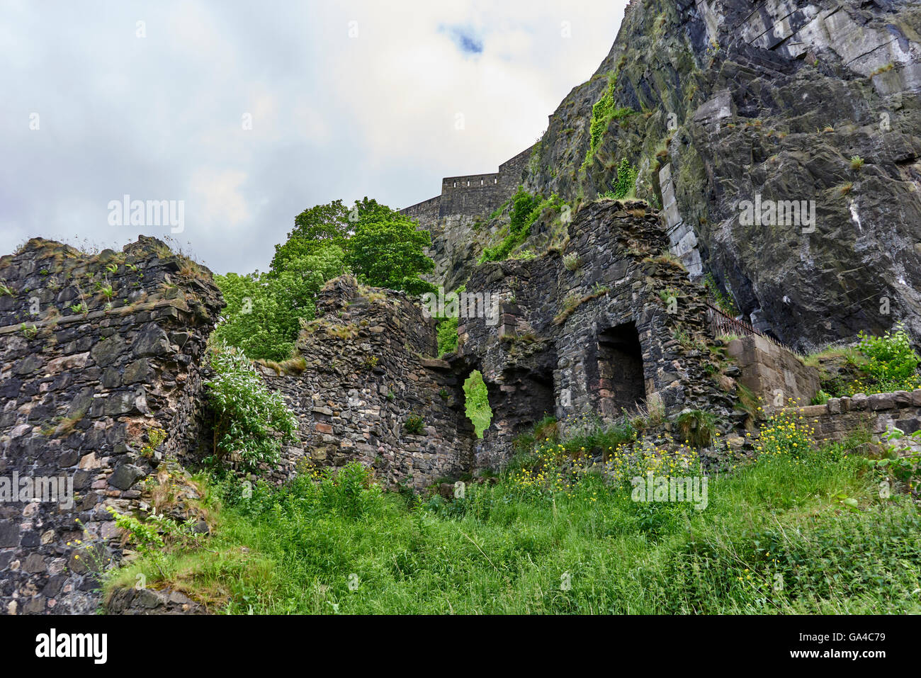 Edinburgh Castle is a historic fortress, which dominates the skyline of ...