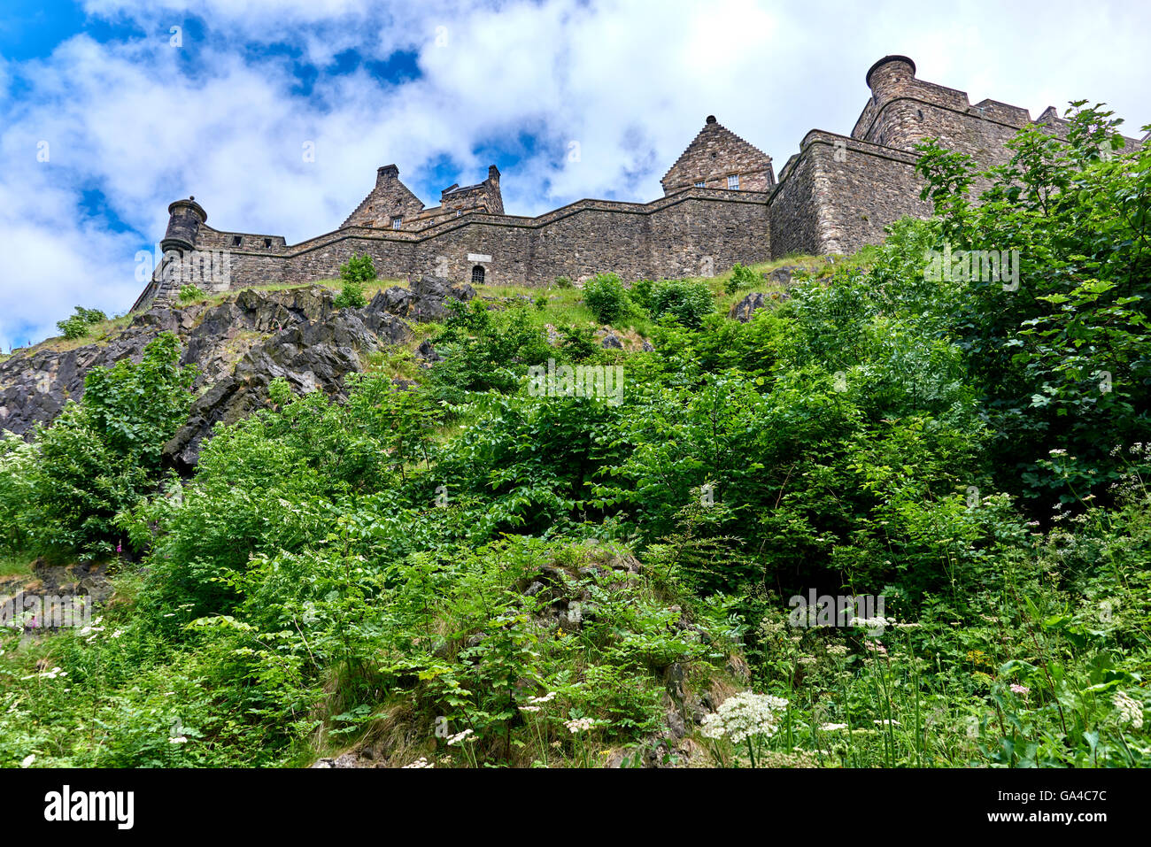 Edinburgh Castle is a historic fortress, which dominates the skyline of ...