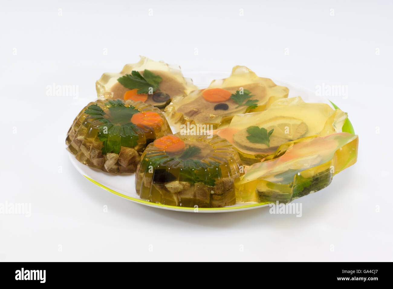 freshly cooked meat jelly on a plate with a white background Stock ...