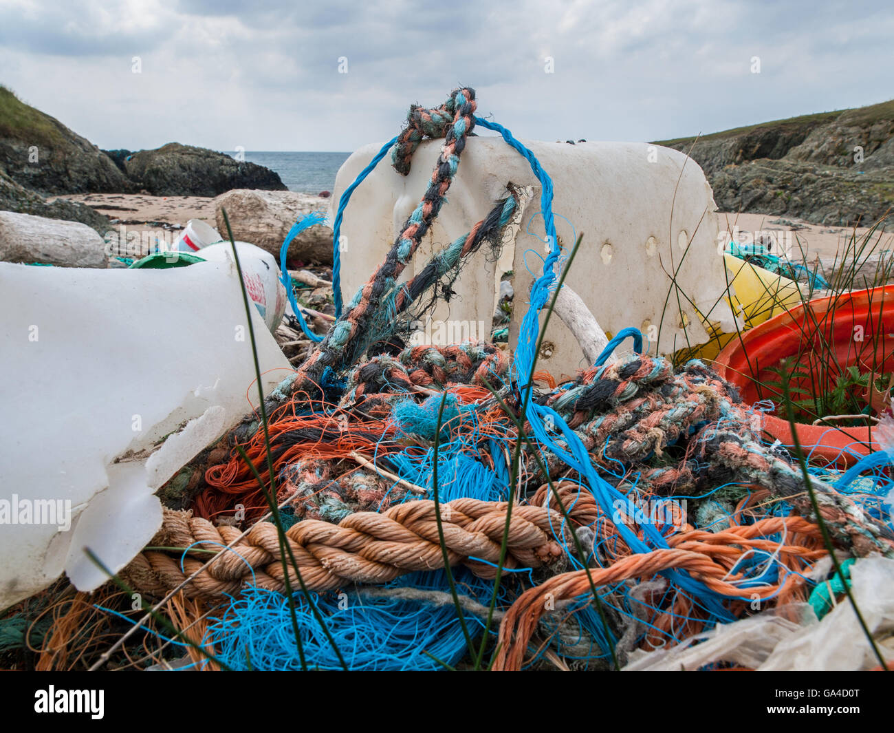 Plastic rubbish, fishing nets and other waste on a Welsh beach Stock ...