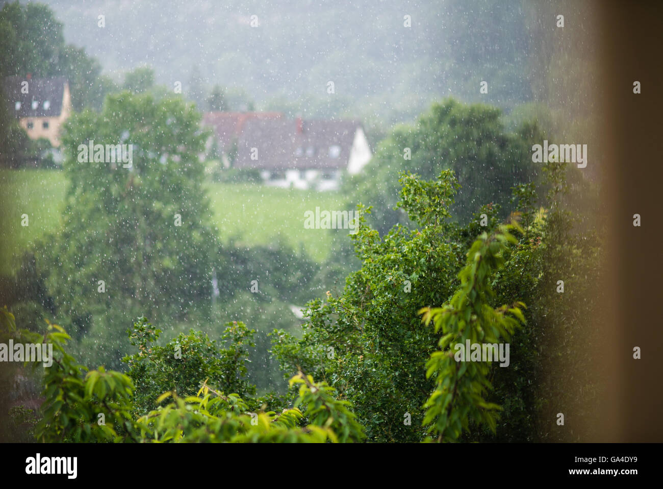 Cottage village in rain hi-res stock photography and images - Alamy