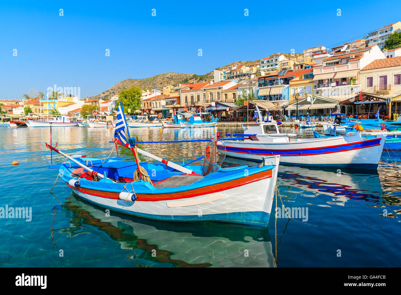Typical colorful Greek fishing boats in Pythagorion port on Samos ...